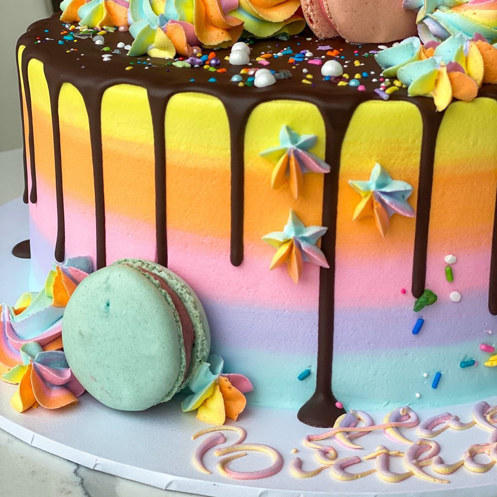 Rainbow Rosettesw/ Macarons & Drip (Inscription on Board) - Oakmont Bakery